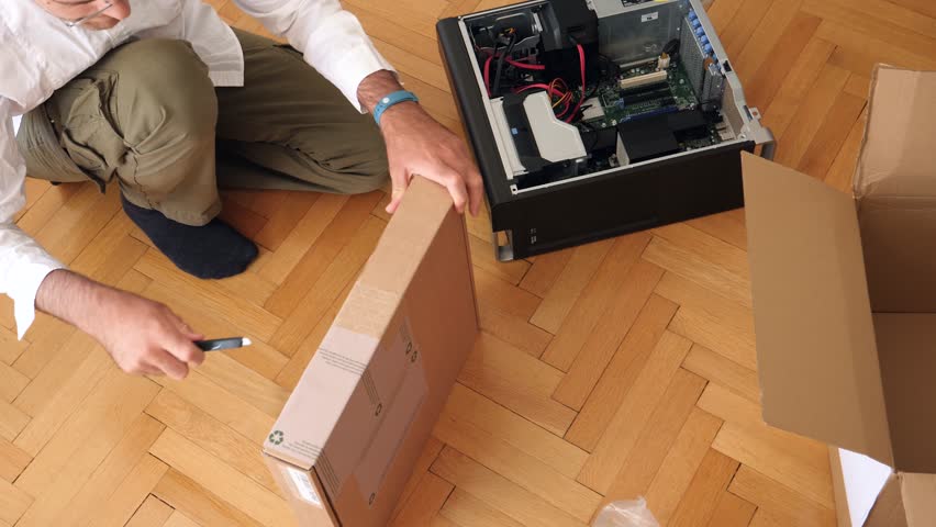 LONDON, UNITED KINGDOM - CIRCA 2017: Computer Geek Unboxing Unpacking ...