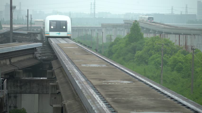 Shanghai Maglev Track With Arriving Train To Take People To Pudong ...