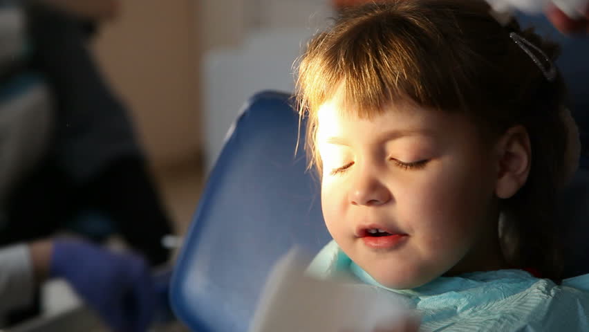 Little Girl At The Dentist Has Tooth Treated. Girl Crying In Pain Stock ...