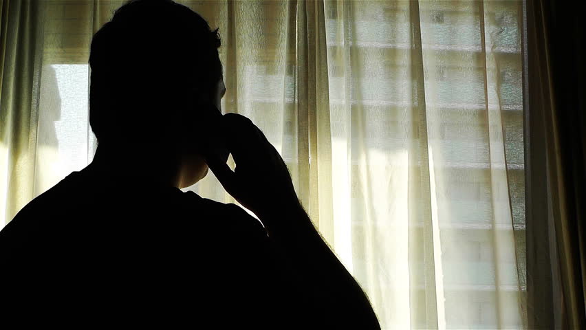 Video stock a tema man talking phone silhouette secret agent | 3991477 ...