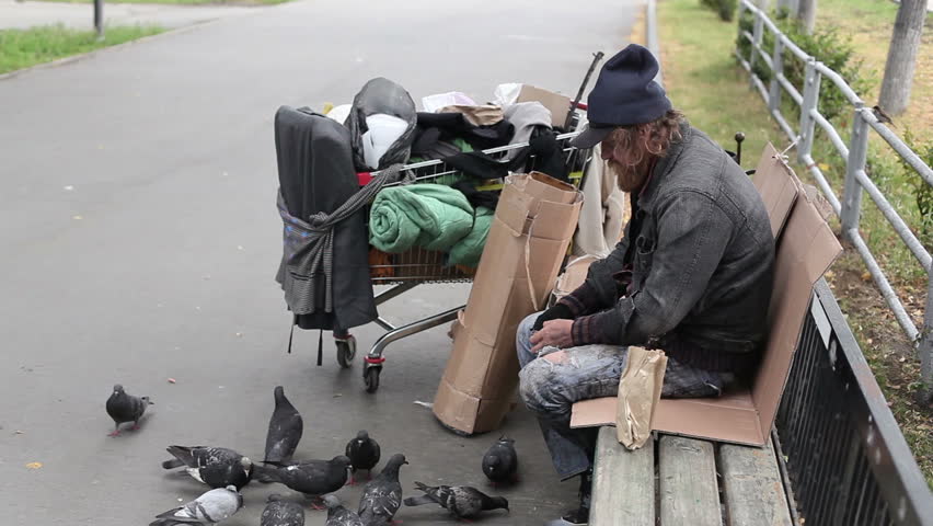 Stock video of homeless man in ragged clothes throwing | 4349387 ...