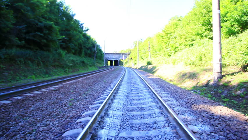 AERIAL. Camera Flight From Train Tracks To The High Summer Sunset Sky ...