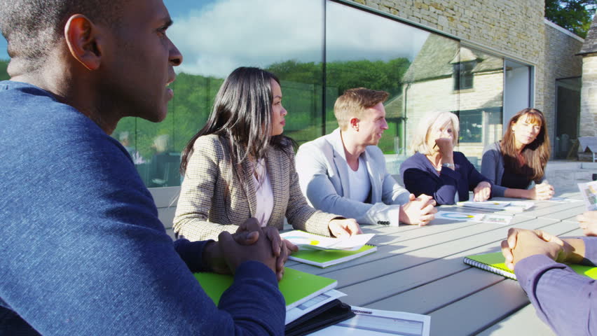 Stock video of diverse business team in outdoor meeting | 5151047 ...