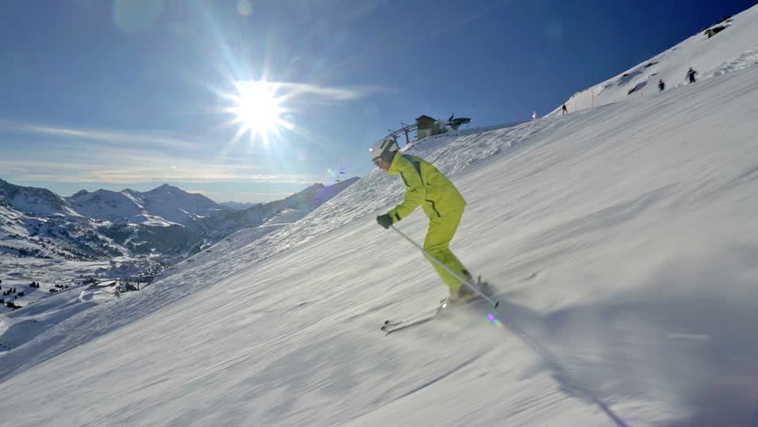 Stock video of side view alpine skier skiing short | 5196587 | Shutterstock