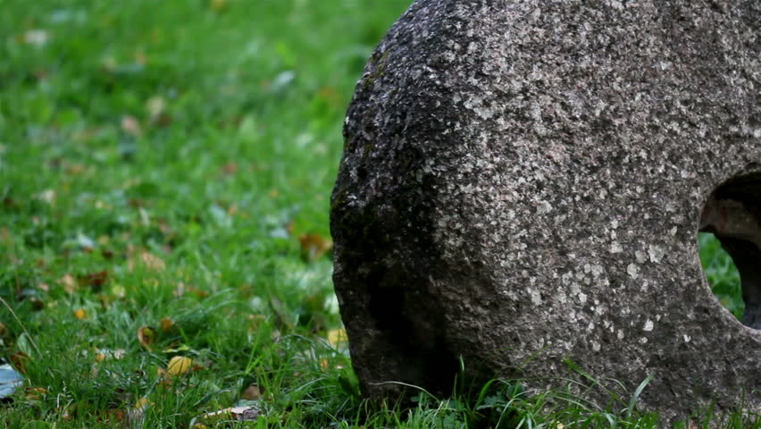 Hole In The Middle Of The Rock. The Big Rock Lying On The Ground Has ...