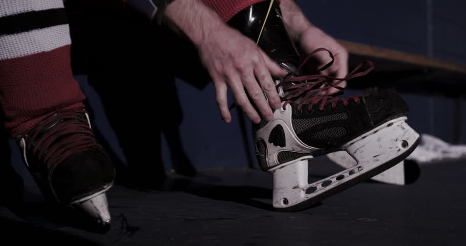 Ice Hockey Dressing Room - Tying Up Skates - Lacing Up Stock Footage ...