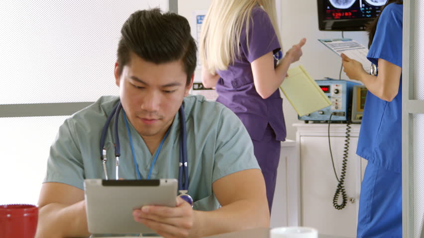 Stock video of young asian doctor or medical intern | 5577167 ...