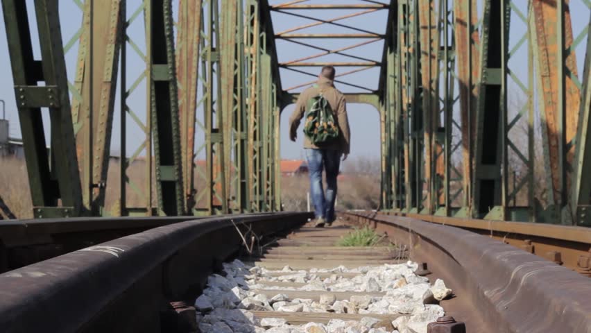Someone Walking On Railroad Tracks Stock Footage Video (100% Royalty ...