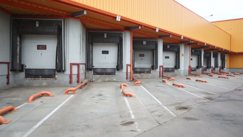 Row Of Gates For Trucks To Load Goods On A Large Warehouse Stock ...