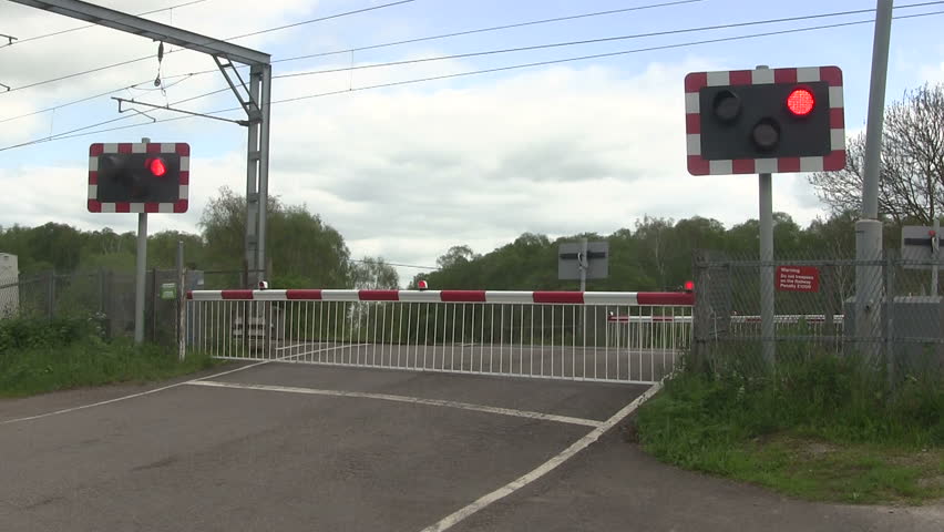 Red Flashing Lights Just Befog The Barrier Comes Down At A Level ...