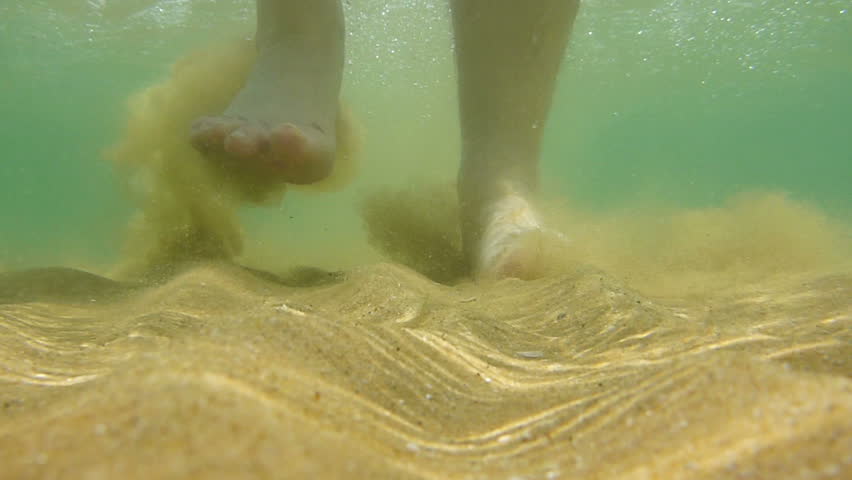 Stock Video Clip of Underwater footsteps of a man in the | Shutterstock