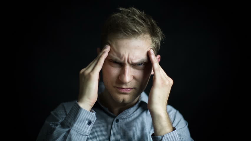 Stockvideo-Clip von Closeup portrait of stressed man with headache ...