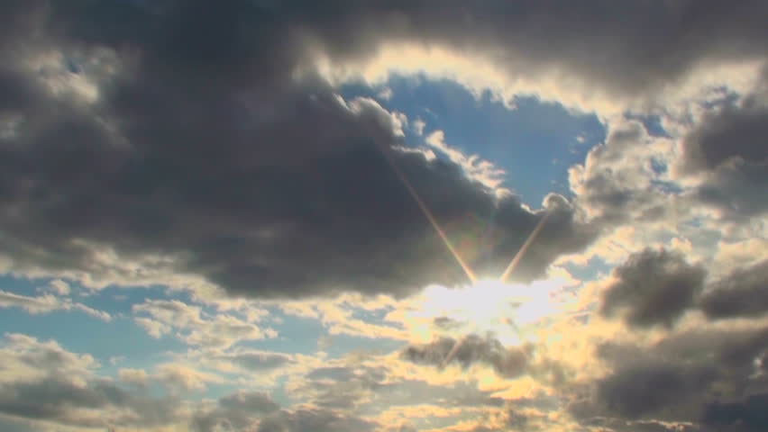 Stock Video Clip of Time lapse, sunburst through clouds. 1920x1080 ...