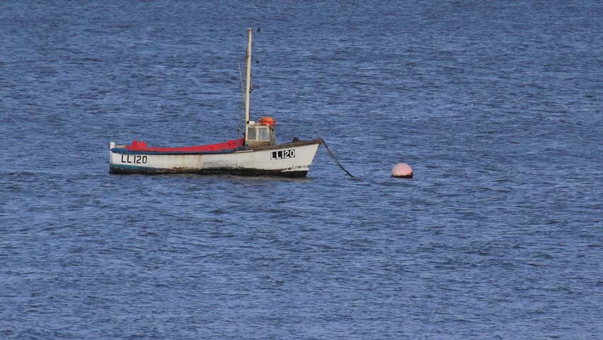 Stock Video Clip of 4k Boat bobbing up and down and | Shutterstock