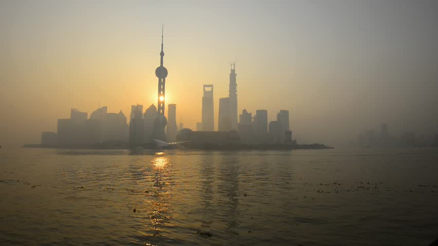 China - January 2012: Warm Tone View Of Sunrise Behind Modern Shanghai ...