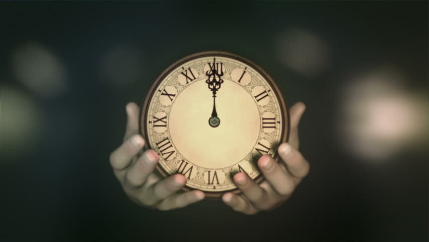 Passing Of Time. Hands Holding Fast Turning Clock. Saturated Grading ...