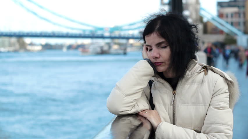 Stock video of sad woman near the river in | 9336497 | Shutterstock