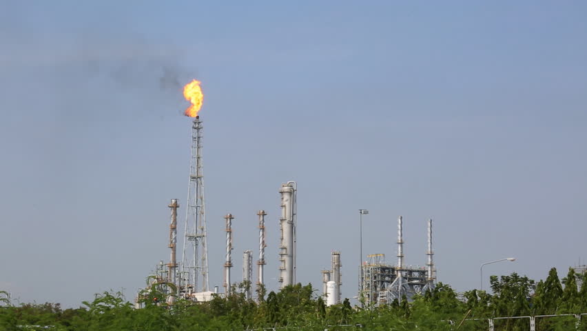 Fire From Flare Structure In Petrol Chemical Plant In Day Time Stock ...