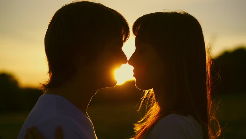 An Indian Couple Looking Deep Into Each Others Eyes While Encircling ...